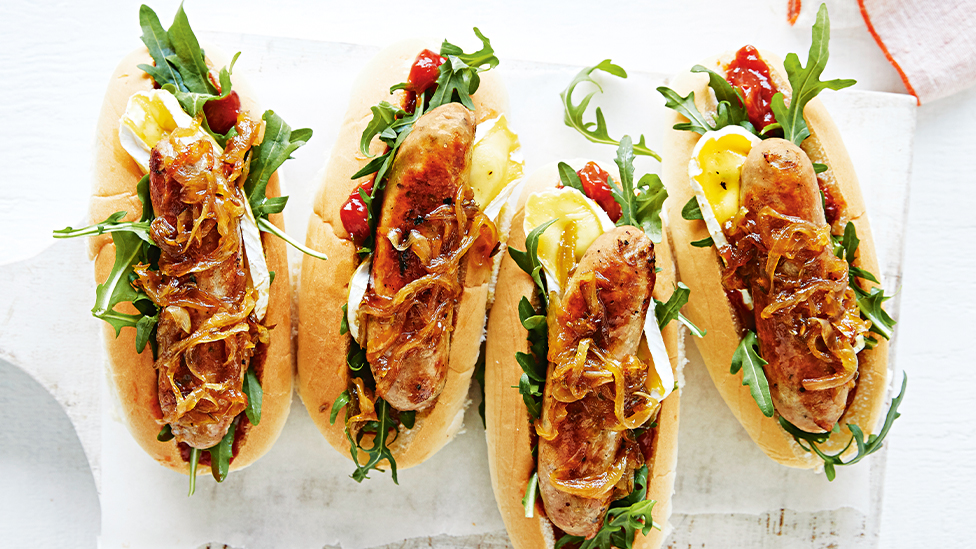 Quick and Easy Caramelised Onion and Brie Hot Dogs Recipe | Coles