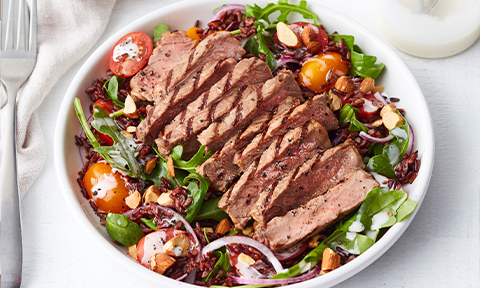 Porterhouse steak with quick tomato rice salad recipe | Coles